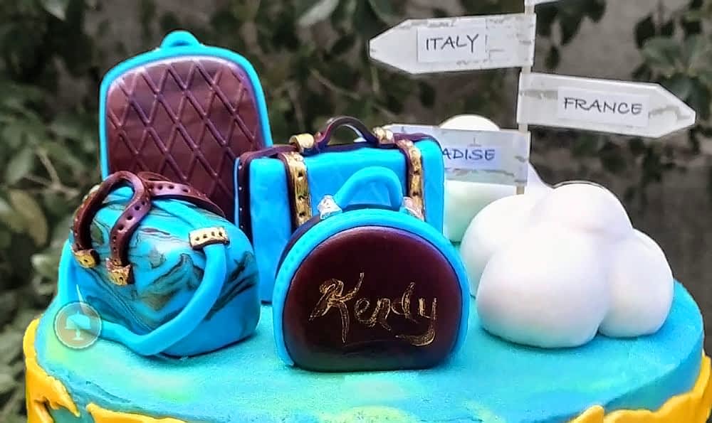 Fun And Creative Travel Cake With Map And Luggage Toppers